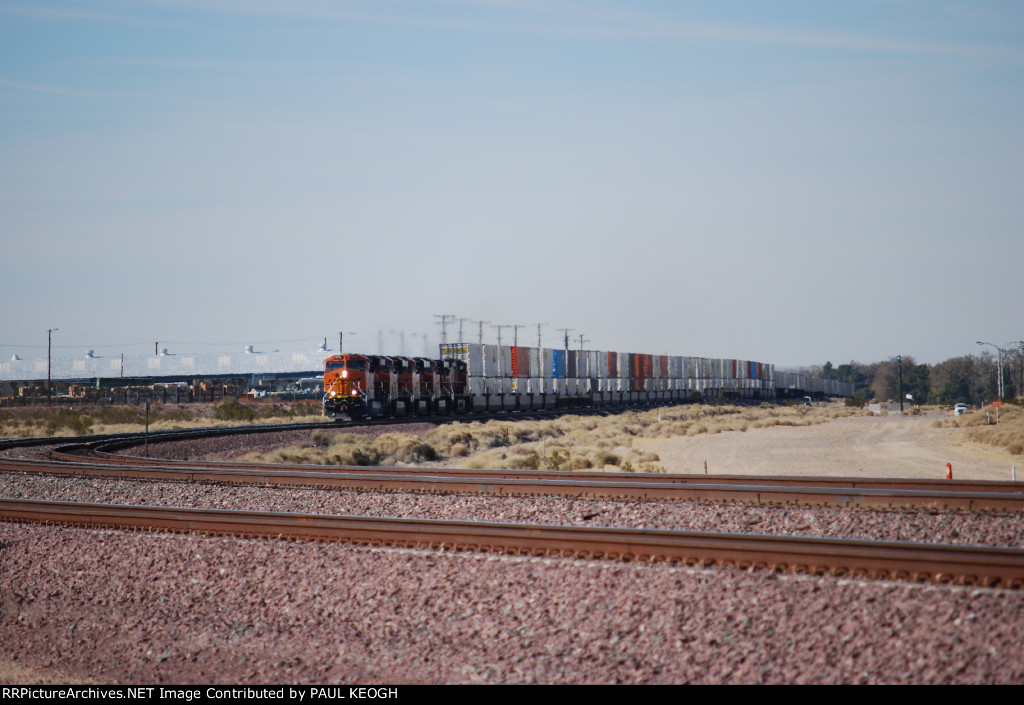 BNSF 6826 passes the MCAB Nebo as she starts to gain speed with a new crew aboard going eastward ...
